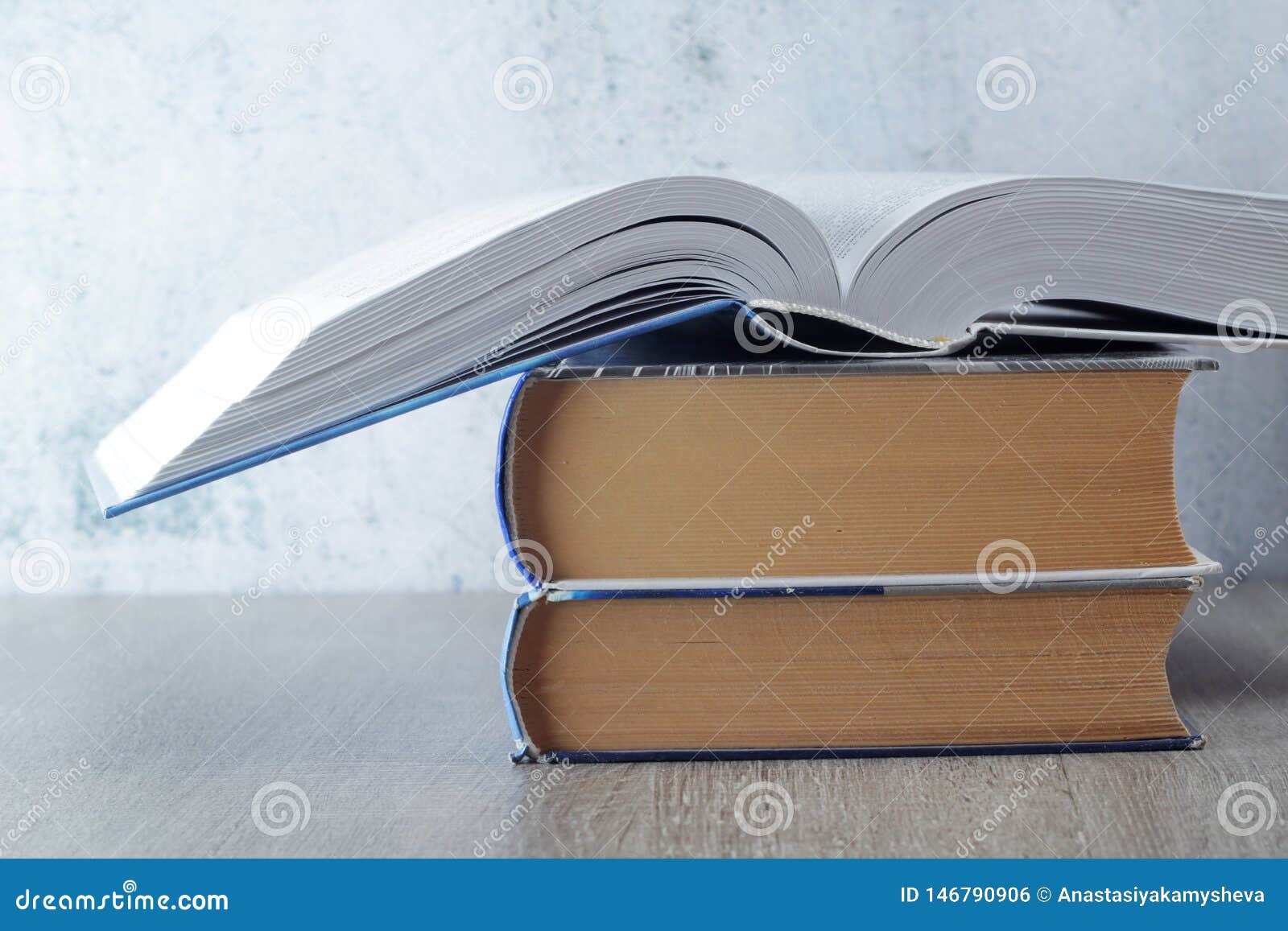 A stack of open books stock photo. Image of stacked - 146790906
