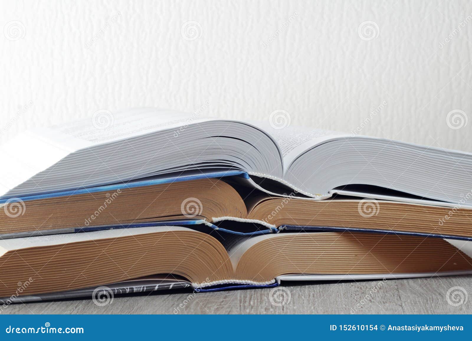 A stack of open books stock photo. Image of science - 152610154