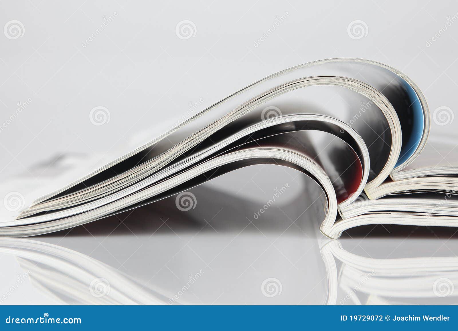 Stack of open magazines stock photo. Image of global - 19729072
