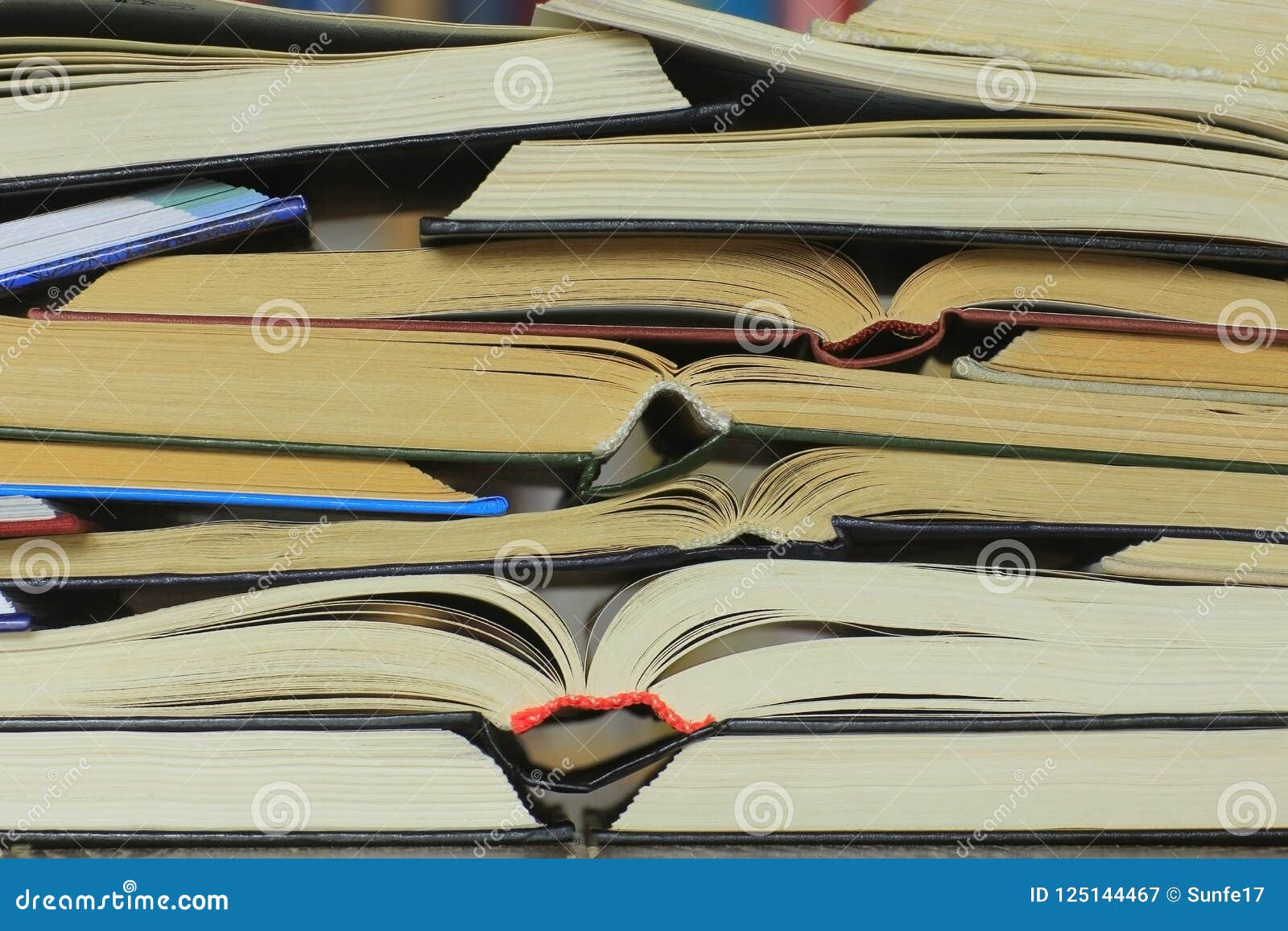 Stack of opened books stock image. Image of college - 125144467