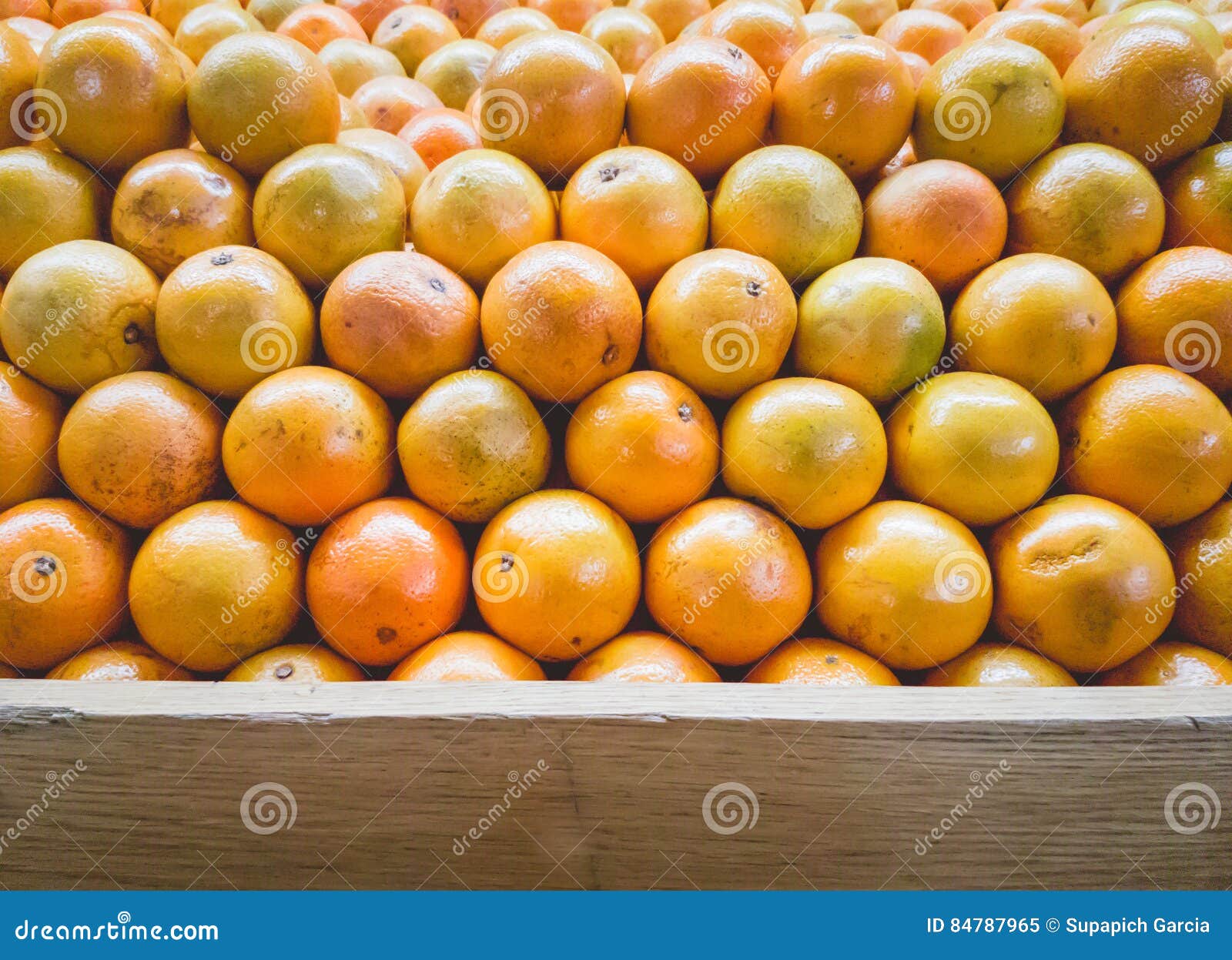 Stack of Oranges on Fruit Shelf Stand with Wood for Copy Space a Stock ...