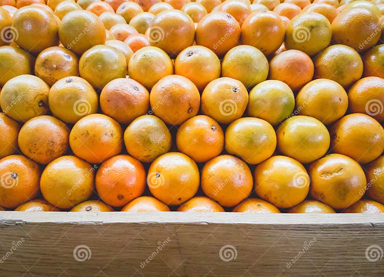 Stack of Oranges on Fruit Shelf Stand with Wood for Copy Space a Stock ...
