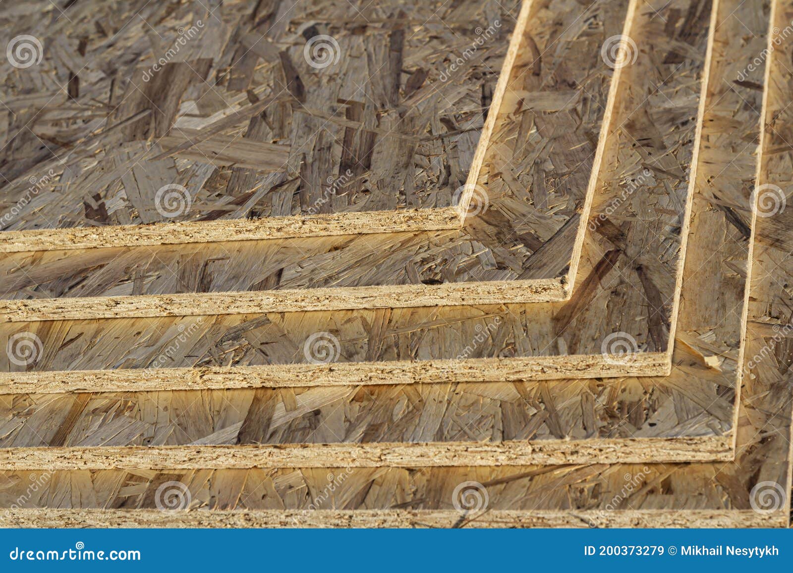 A stack of OSB sheets. stock image. Image of chipboard - 200373279