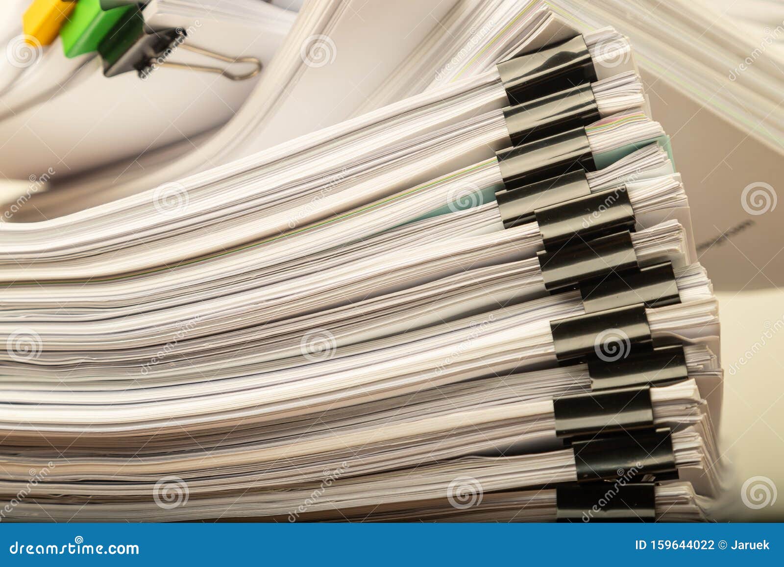Stack of Overload Document Paper with Black Paperclip Stock Photo ...