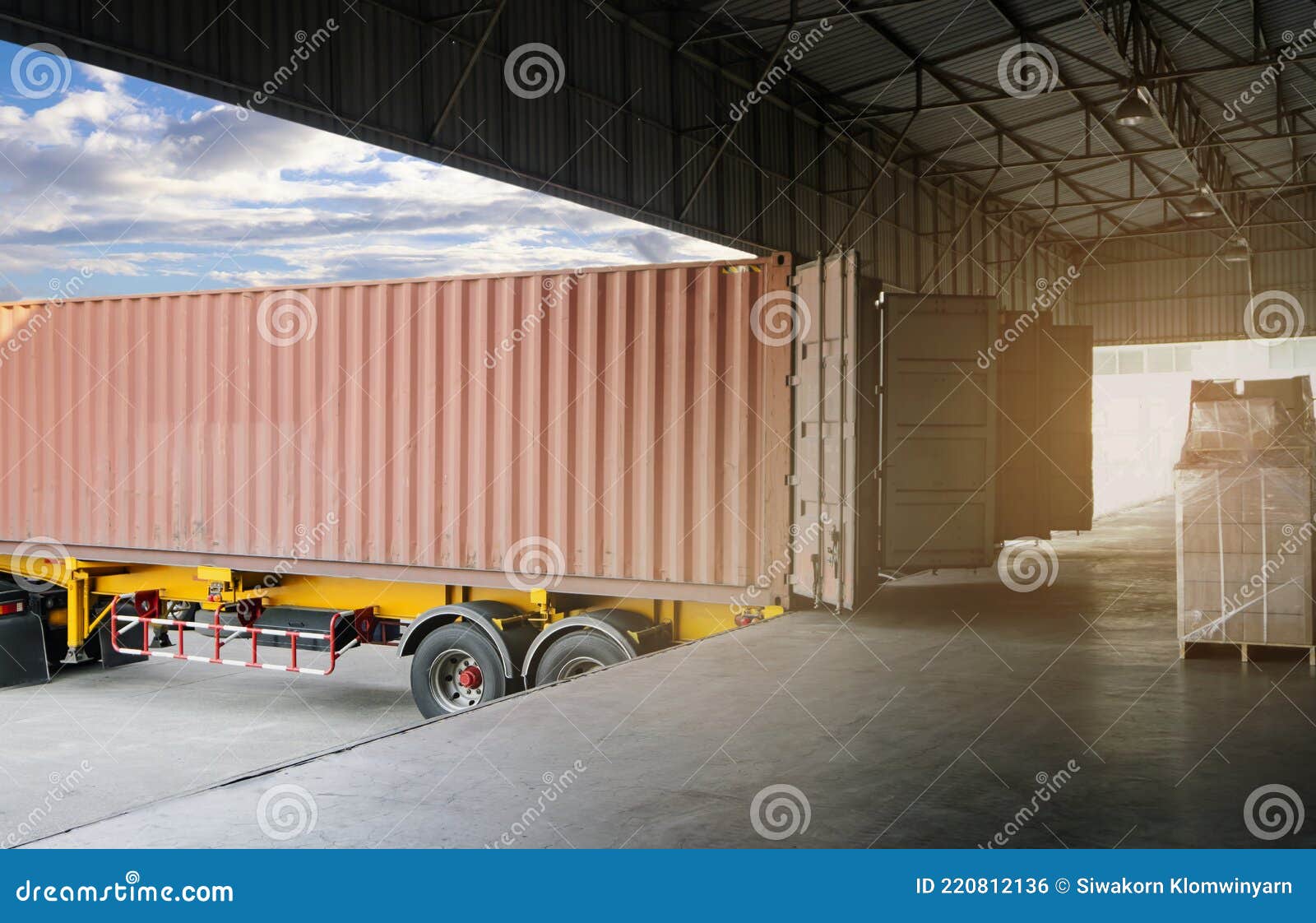 Stack of Package Boxes with Cargo Container. Trailer Parked Loading at ...