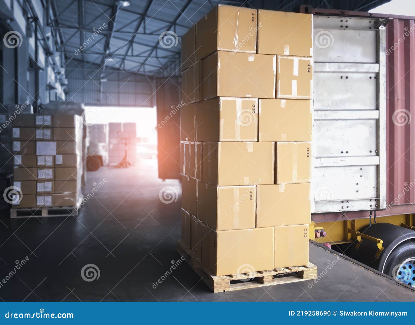 Stack Of Package Boxes On Wooden Pallet At Storage Warehouse. Carton ...