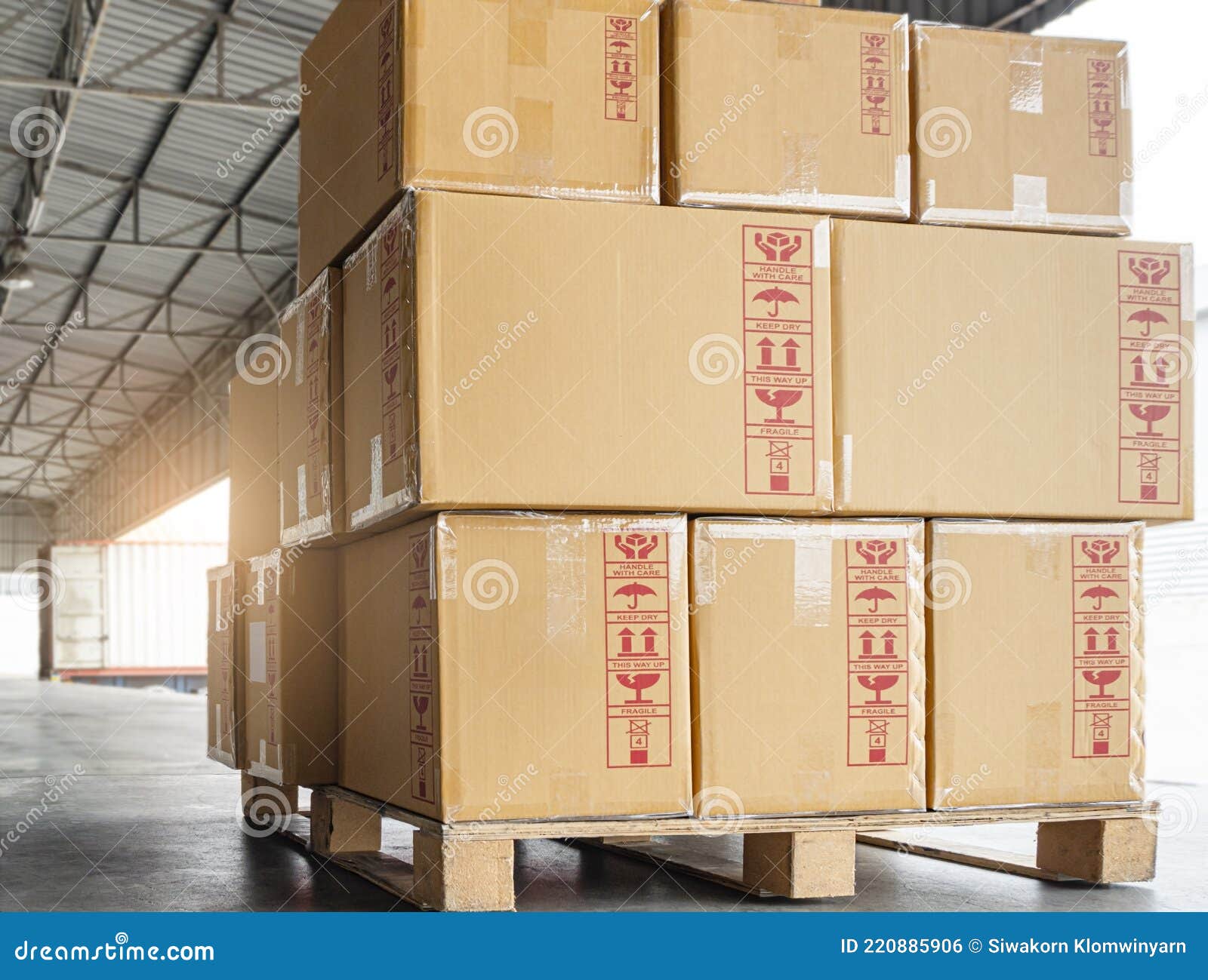 Stack of Package Boxes Load into Container Truck. Truck Parked Loading ...