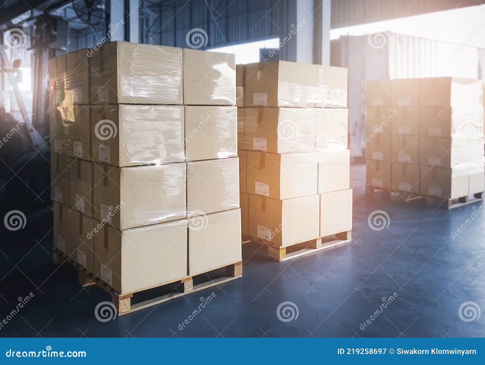 Stack of Package Boxes Load into Shipping Container. Trailer Truck ...