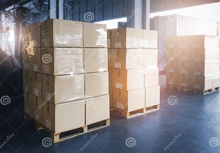 Stack of Package Boxes Load into Shipping Container. Trailer Truck ...