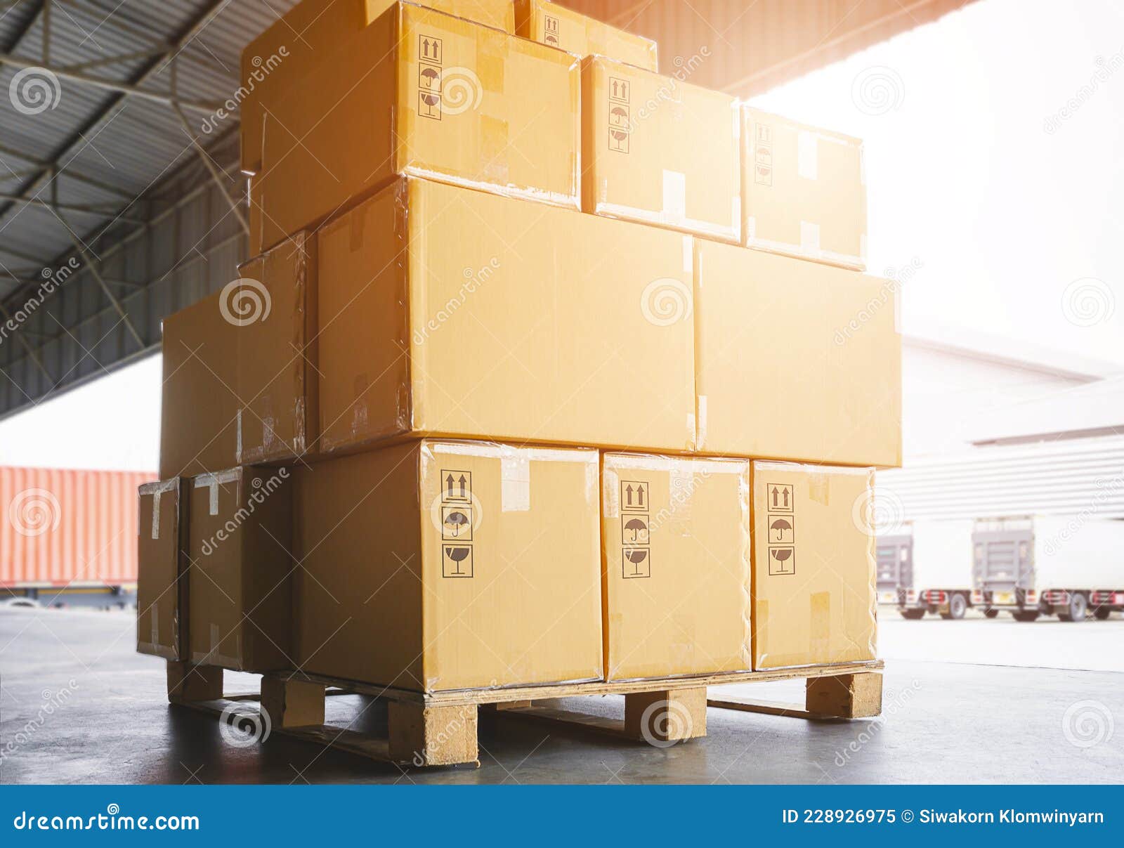 Stack of Package Boxes on Pallet at the Storage Warehouse. Shipping ...