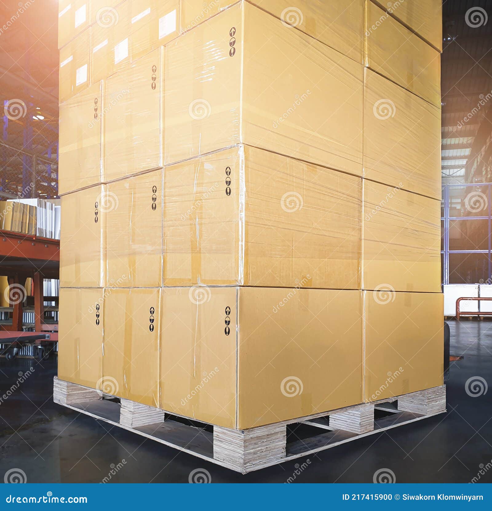 Stack of Package Boxes on Wooden Pallet at Storage Warehouse. Shipment ...