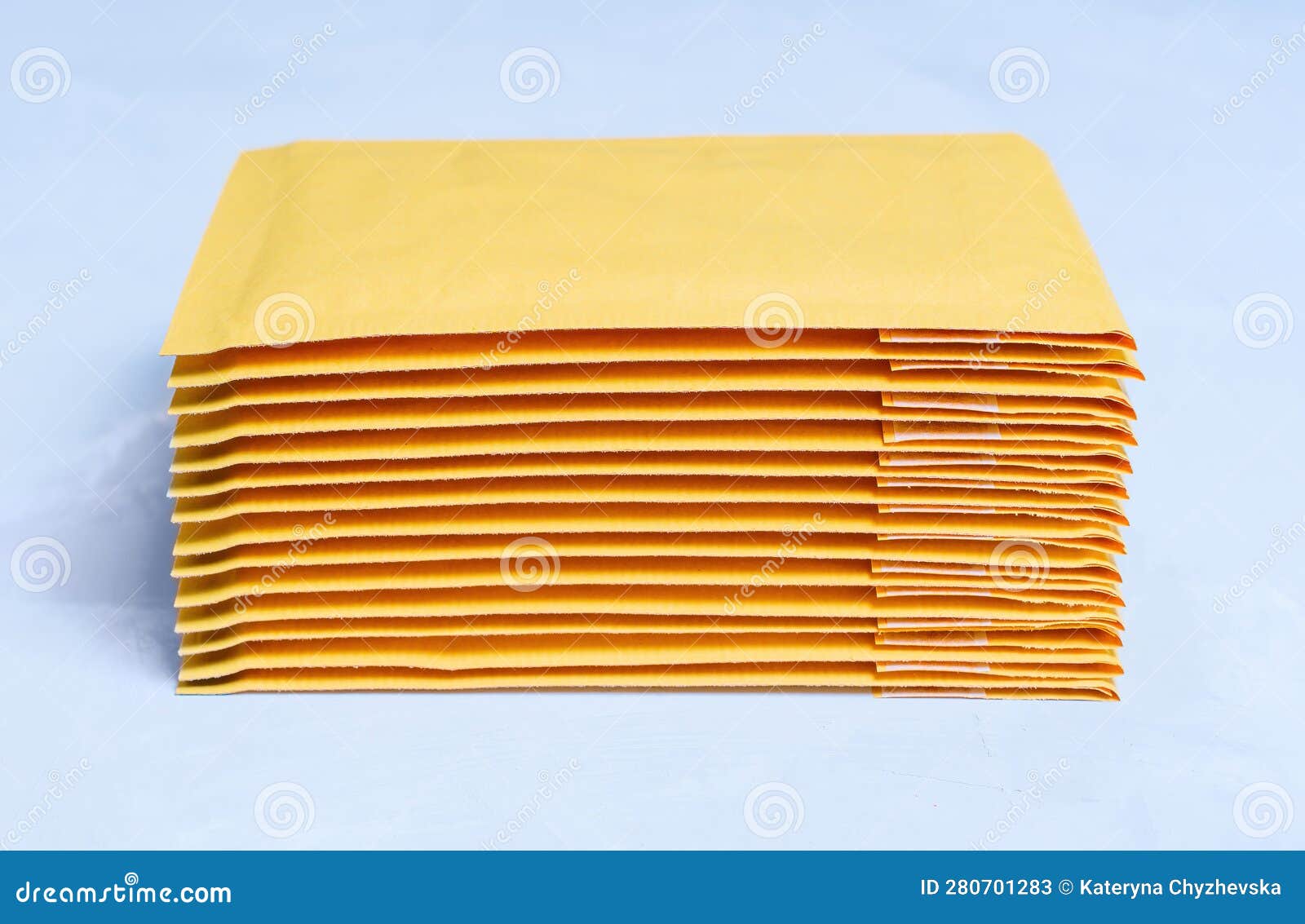 Stack of Padded Envelopes on Grey Background Stock Image - Image of ...