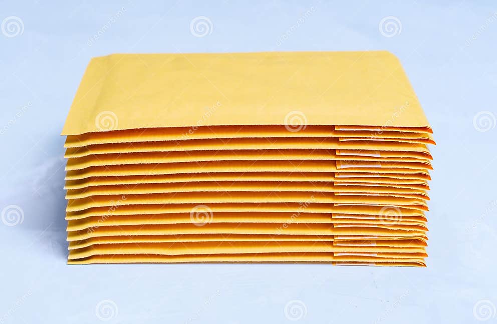 Stack of Padded Envelopes on Grey Background Stock Image - Image of ...