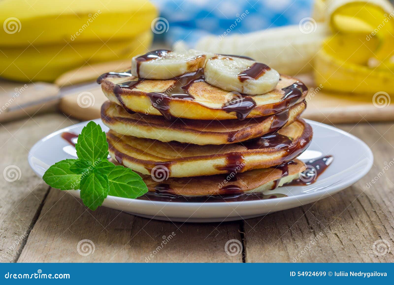 Stack of Pancakes with Banana and Chocolate Syrup Stock Image - Image ...
