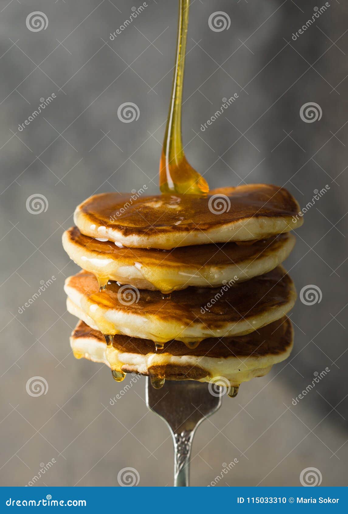 Stack of Pancakes on Fork with Honey. Stock Photo - Image of culinary ...