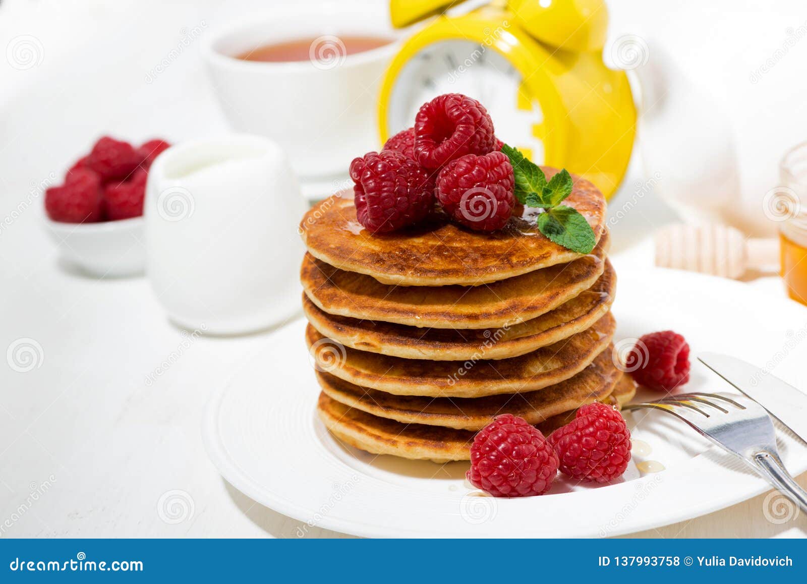 Stack of Pancakes with Fresh Raspberries for Breakfast on White Table ...