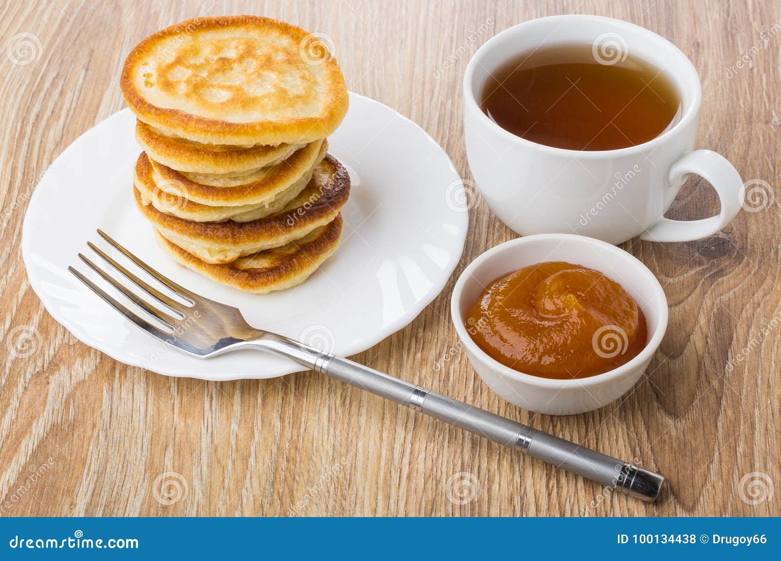 Stack of Pancakes in Plate, Fork, Bowl with Apricot Jam Stock Photo ...