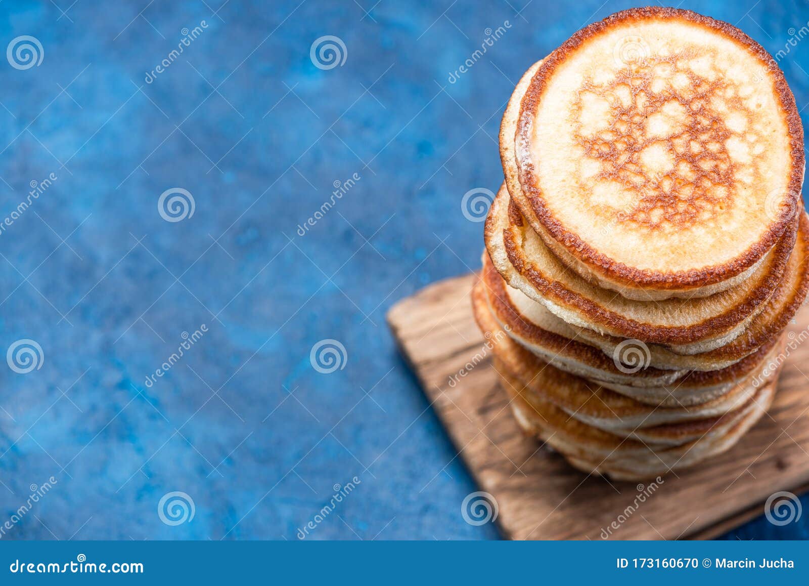 Stack of Pancakes on Wooden Board. Overhead View Stock Photo - Image of ...