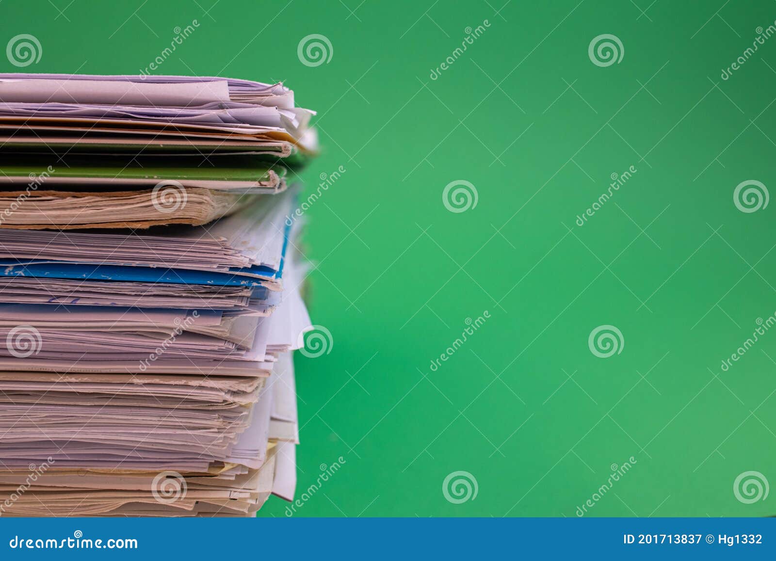 Stack of Paper Against a Green Background Stock Image - Image of high ...