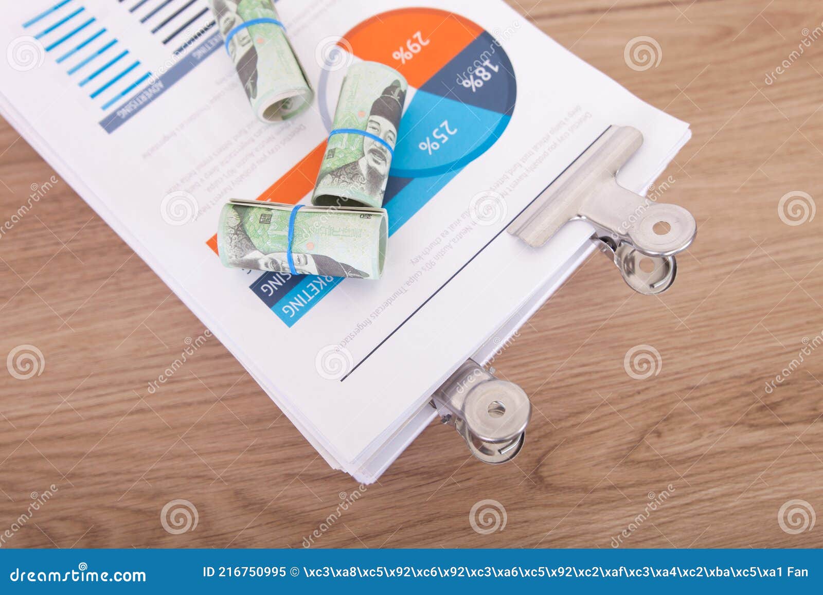A Stack of Paper Business Documents and Several Rolls of Korean Won ...