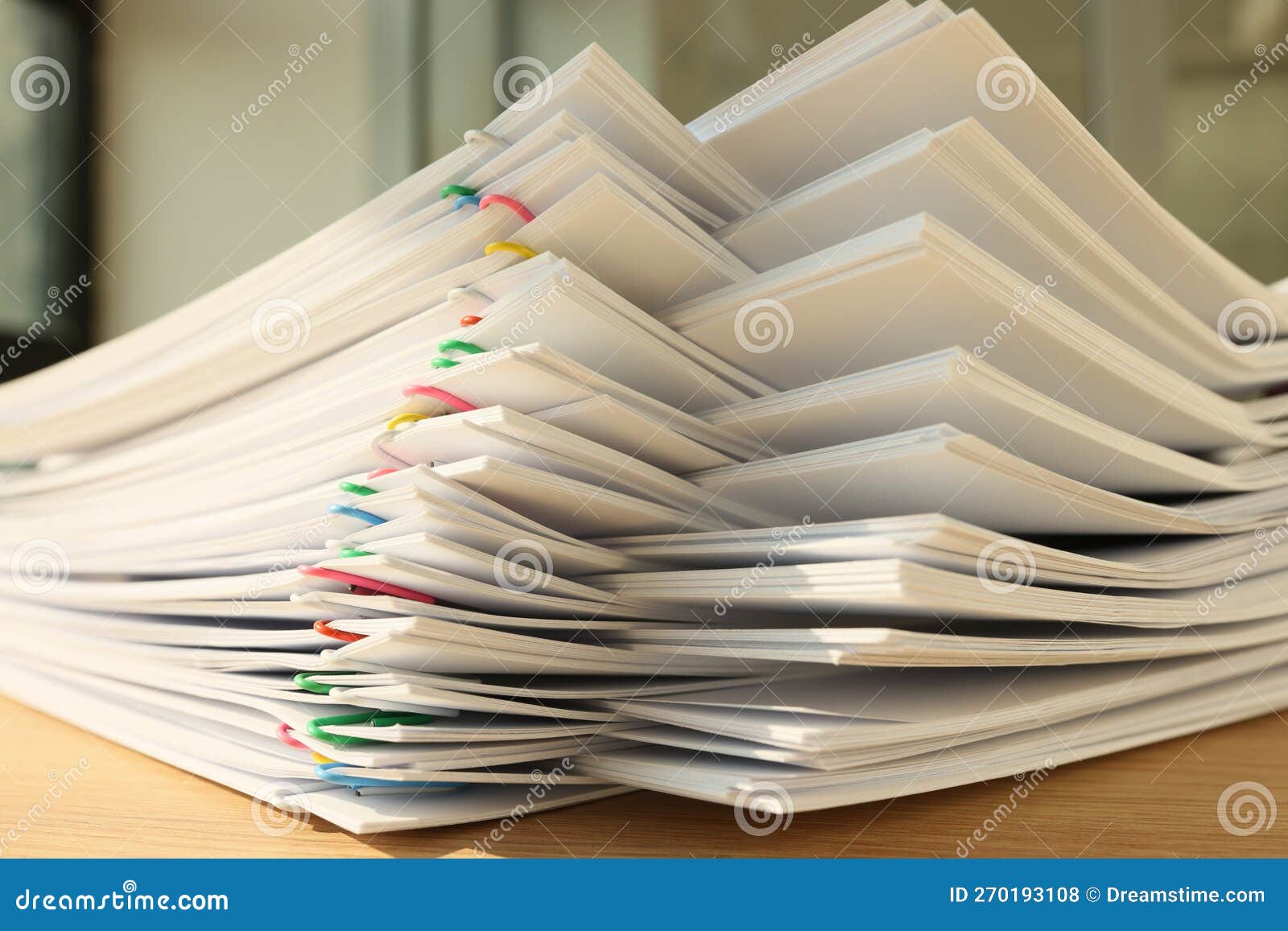 A Stack of Paper with Colored Paper Clips, Close-up Stock Photo - Image ...