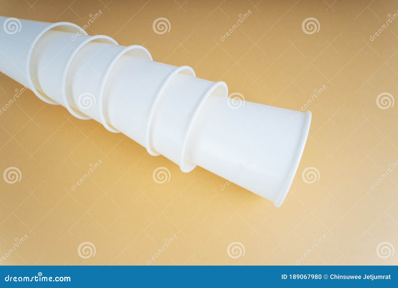 Stack of Paper Cup Laying on Orange Beige Background Stock Photo ...
