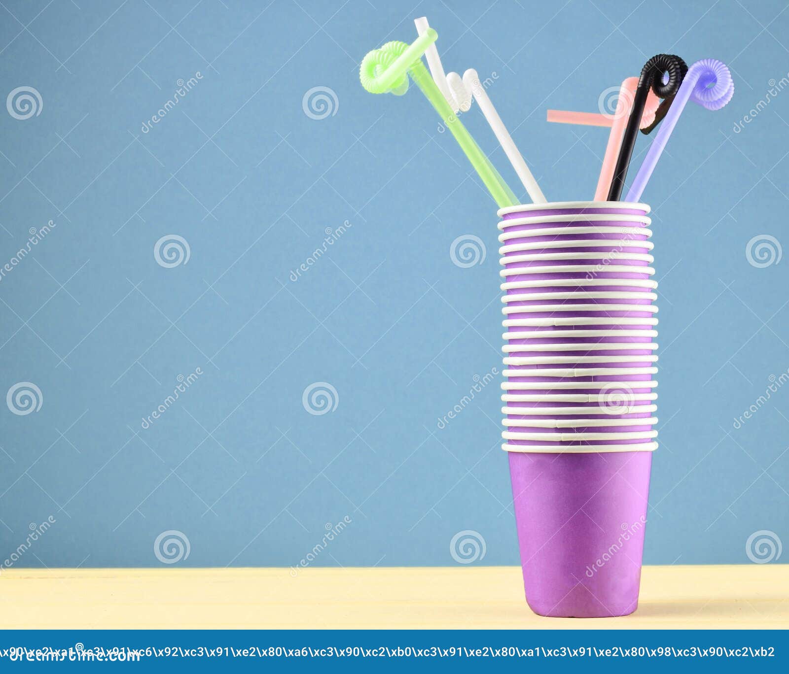 A Stack of Paper Cups with Cocktail Tubes Stock Image - Image of ...