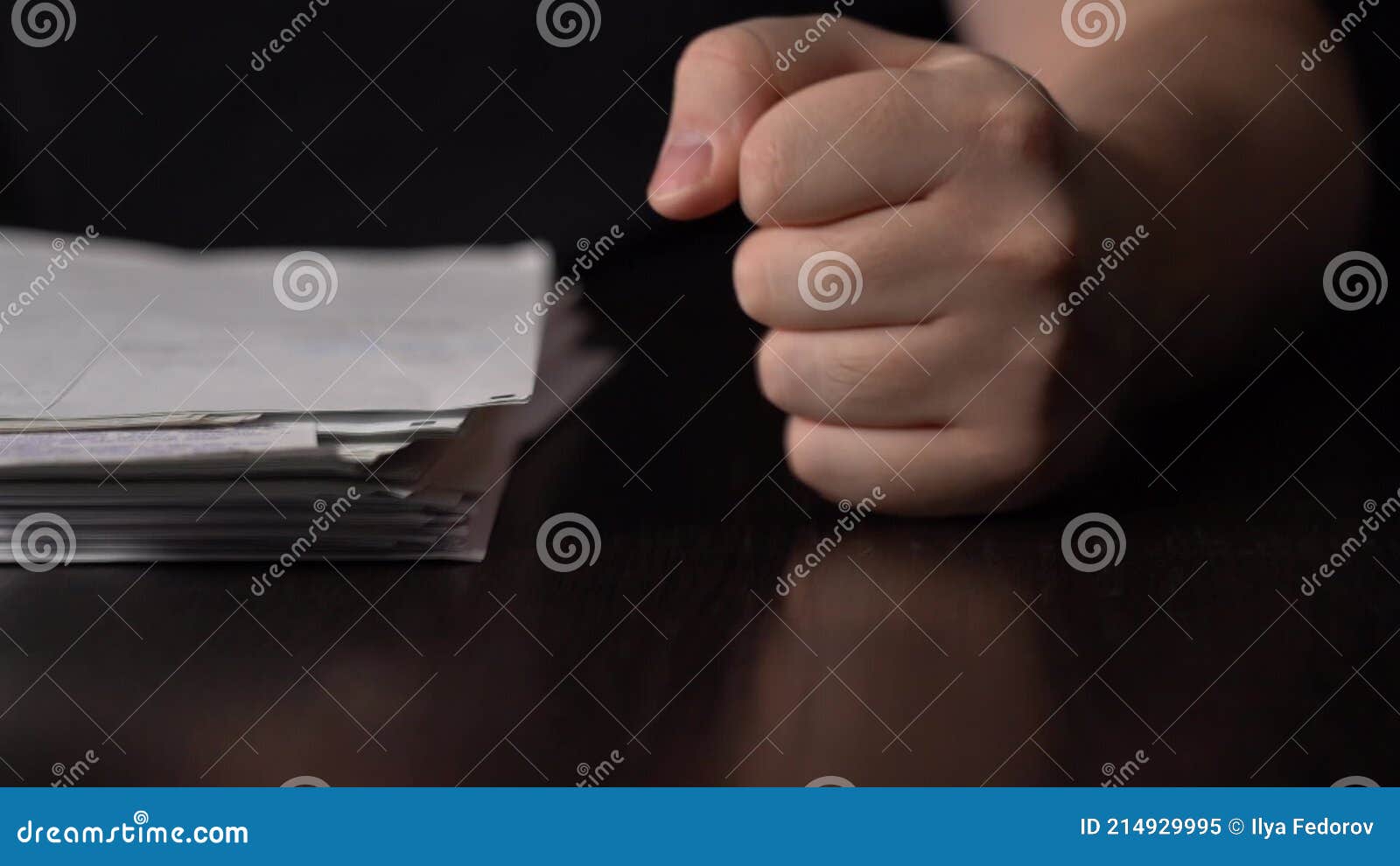 A Stack of Paper Files Falls on the Table. Fists Hit the Pile of Papers ...