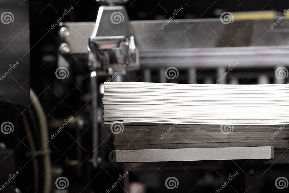 Stack of Paper in a Printing Press Stock Photo - Image of plant ...