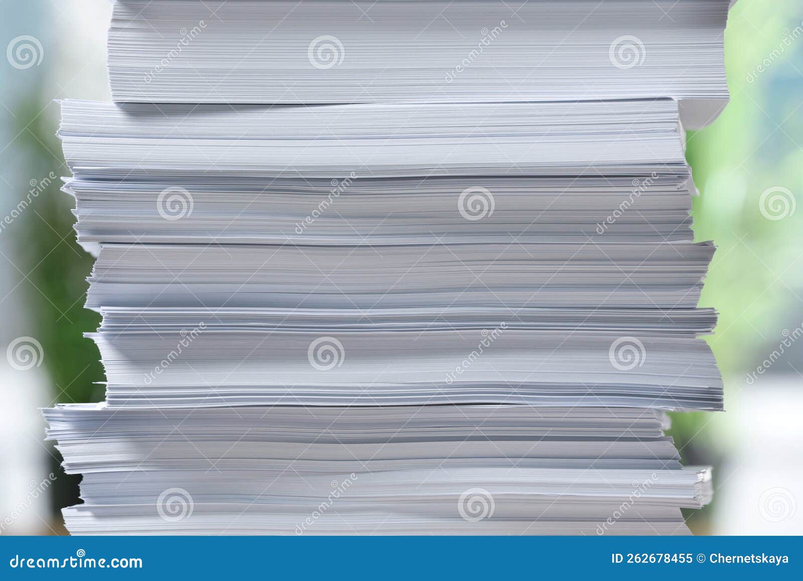 Stack of Paper Sheets Against Blurred Background, Closeup Stock Image ...