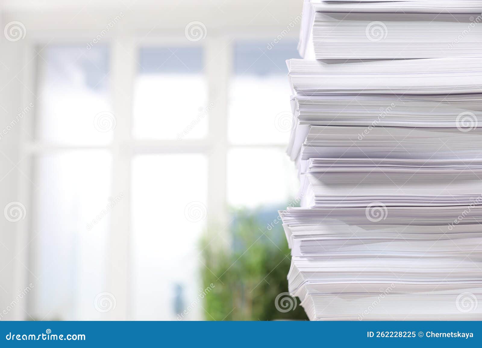 Stack of Paper Sheets Against Blurred Background, Closeup. Space for ...