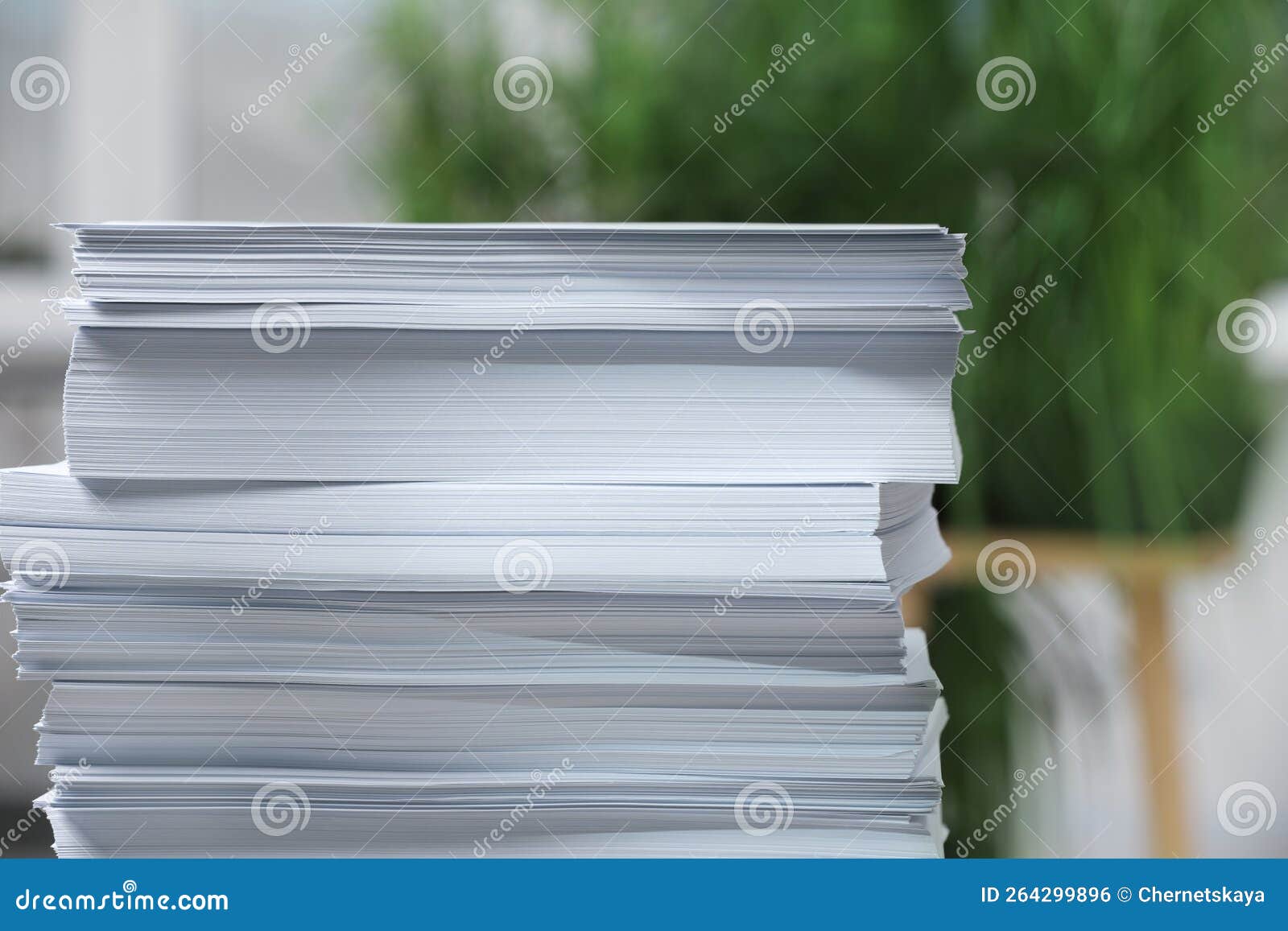 Stack of Paper Sheets Against Blurred Background, Closeup. Space for ...