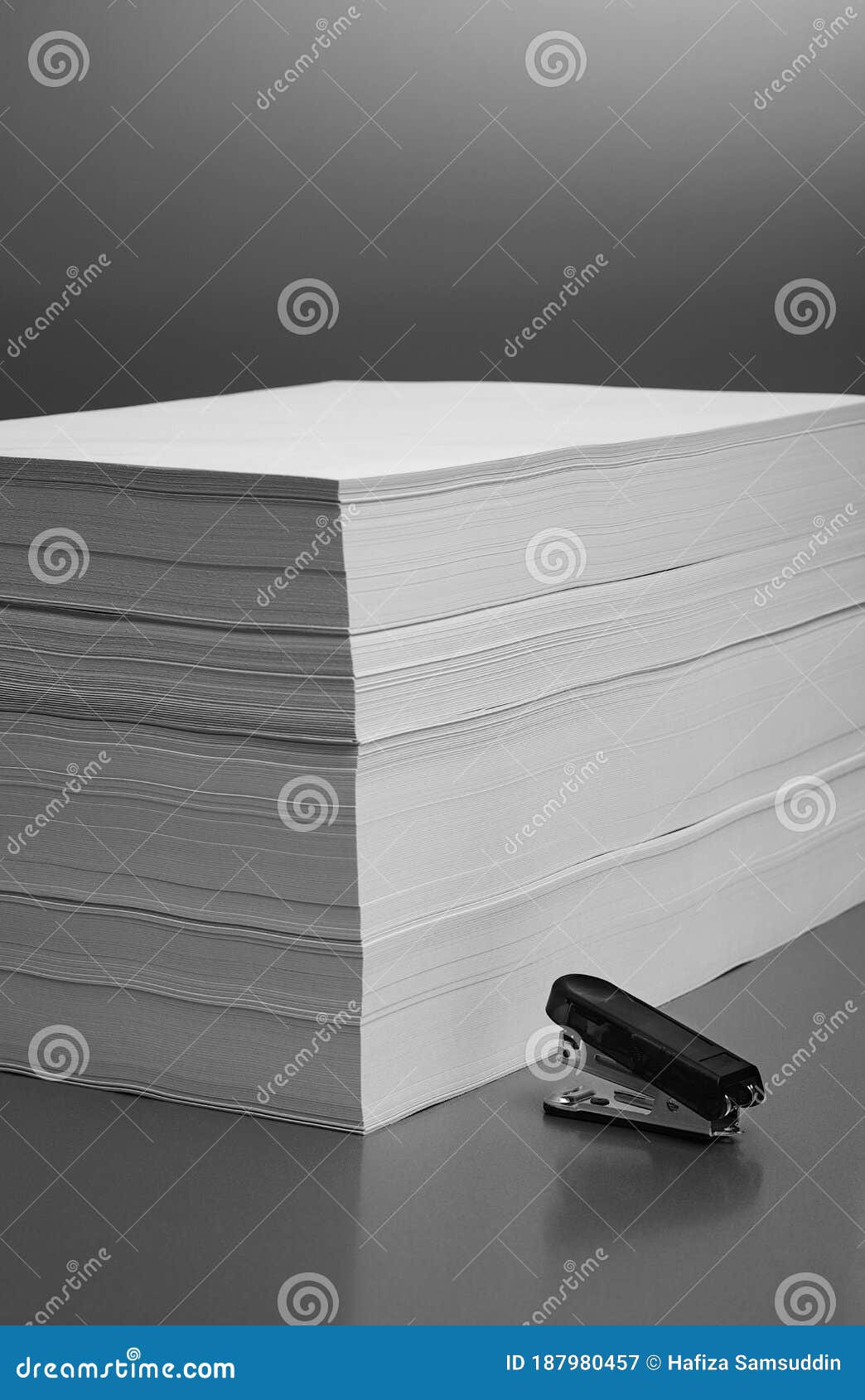 Stack of Paper and a Stapler. Conceptual Image Stock Image - Image of ...