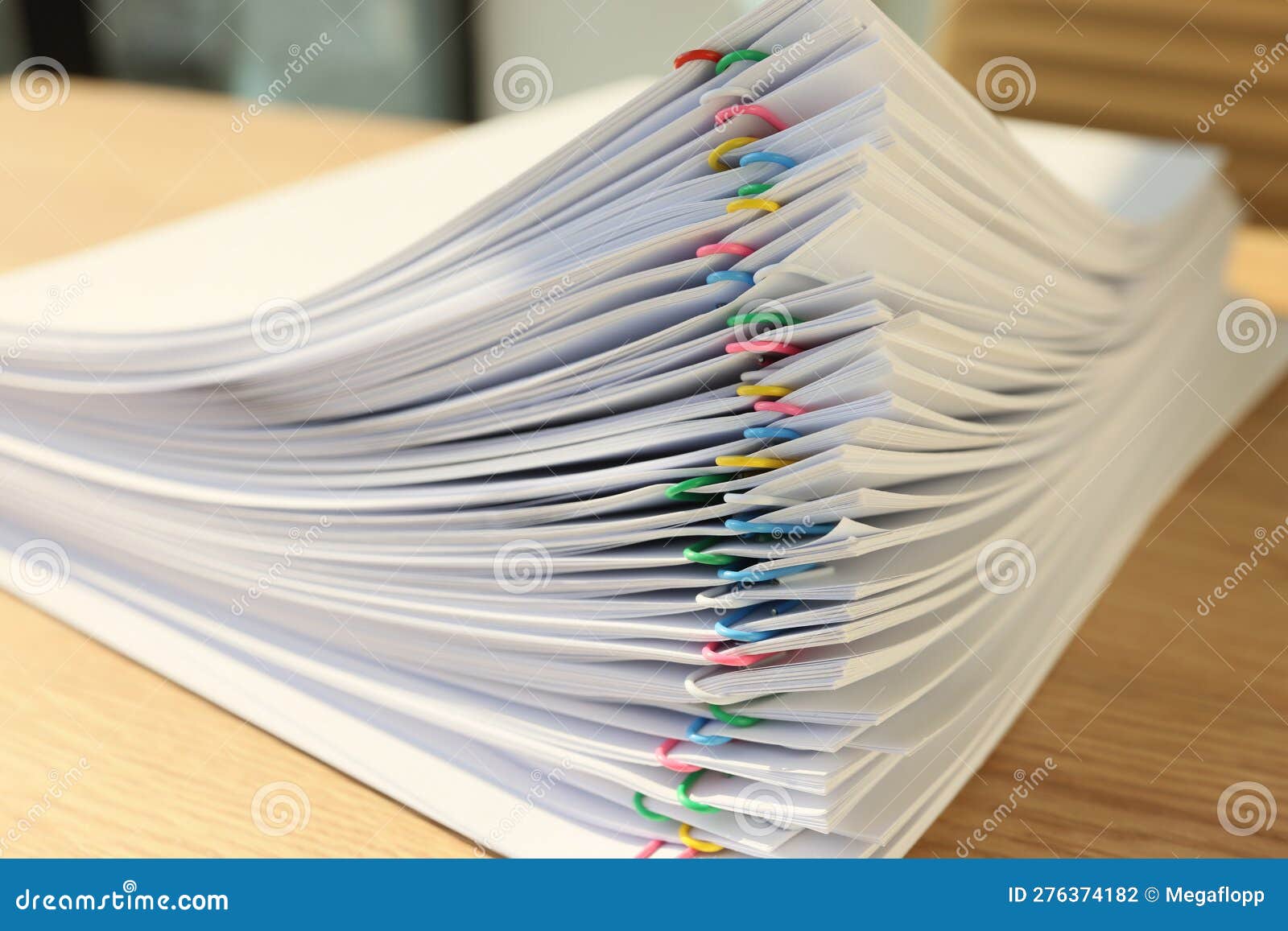Stack of Papers Fastened with Pins Lies on Wooden Table Stock Photo ...