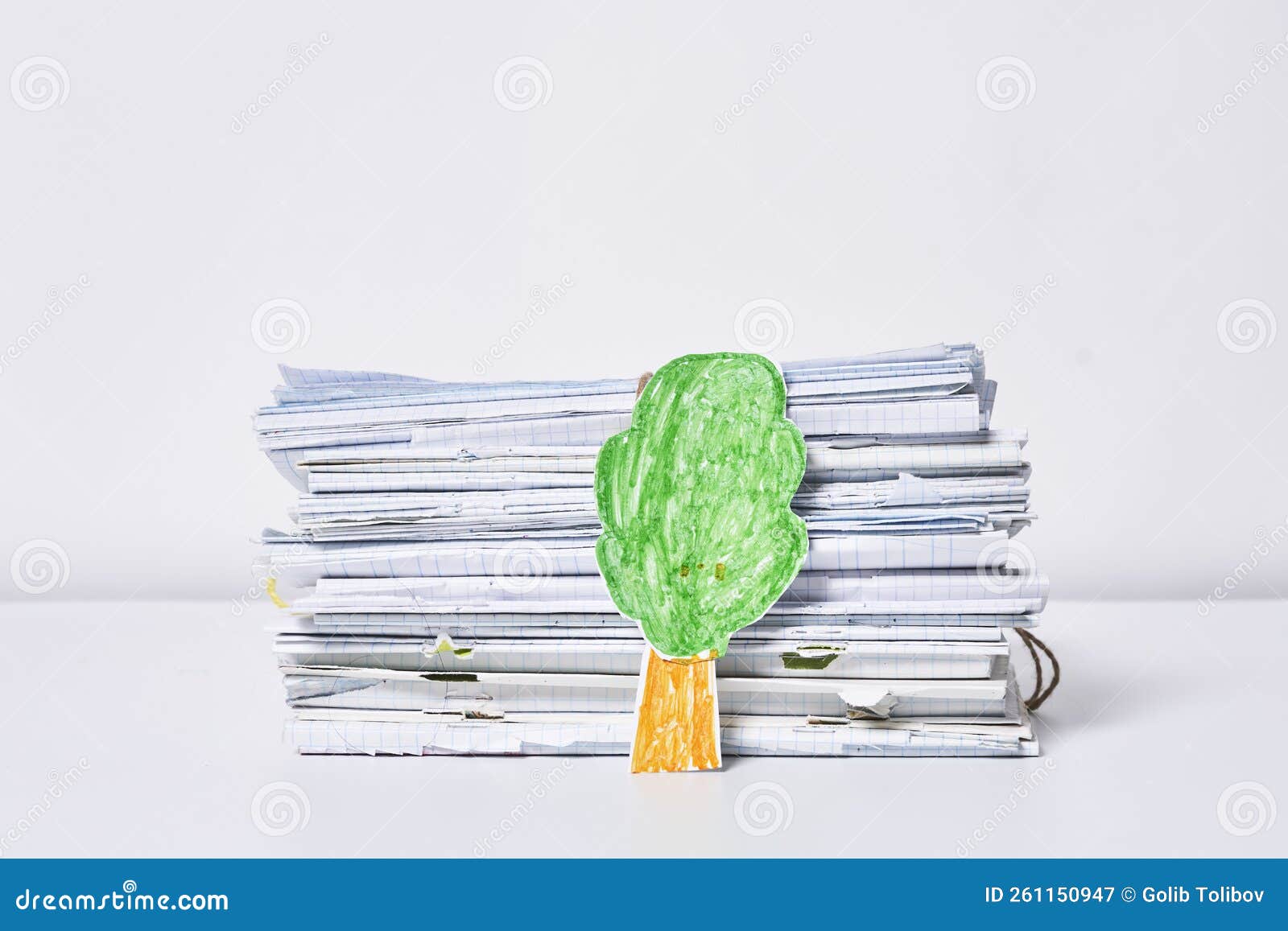 A Stack of Papers with a Piece of Lettuce on Stock Image - Image of ...