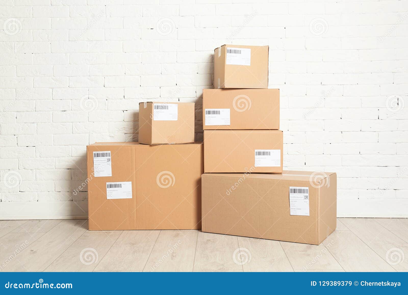 Stack of Parcel Boxes on Floor Stock Image - Image of carton, courier ...
