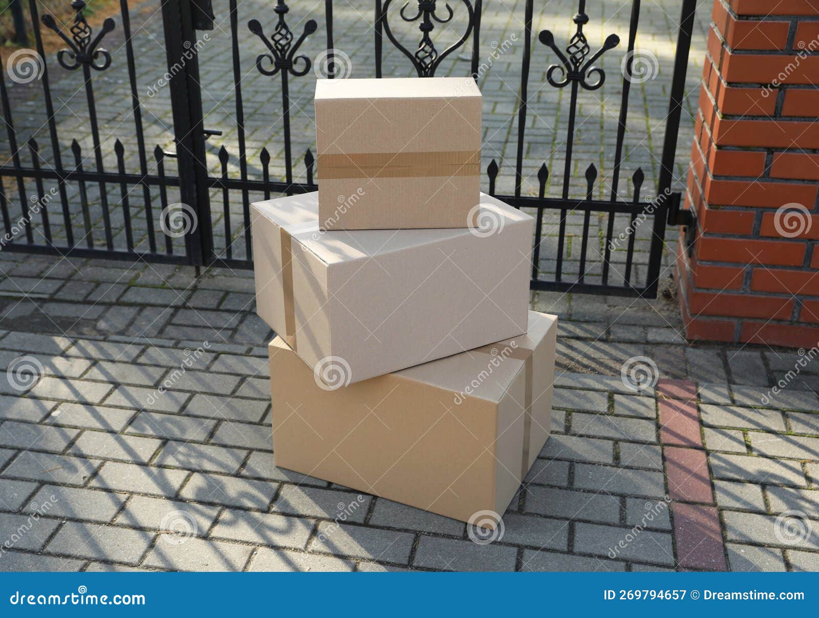 Stack of Parcels Delivered Near Front Gates Stock Image - Image of ...