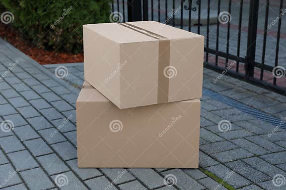 Stack of Parcels Delivered Near Front Gates Stock Photo - Image of ...