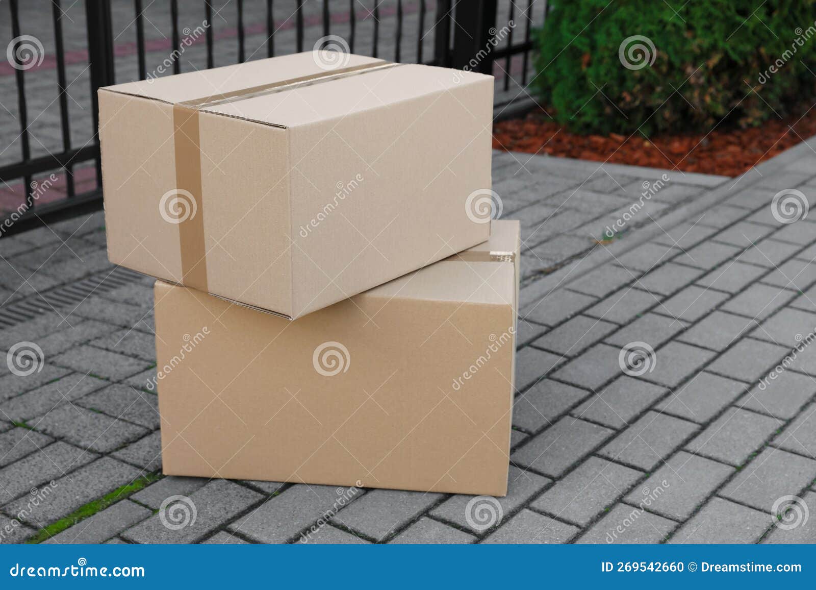 Stack of Parcels Delivered Near Front Gates Stock Photo - Image of home ...
