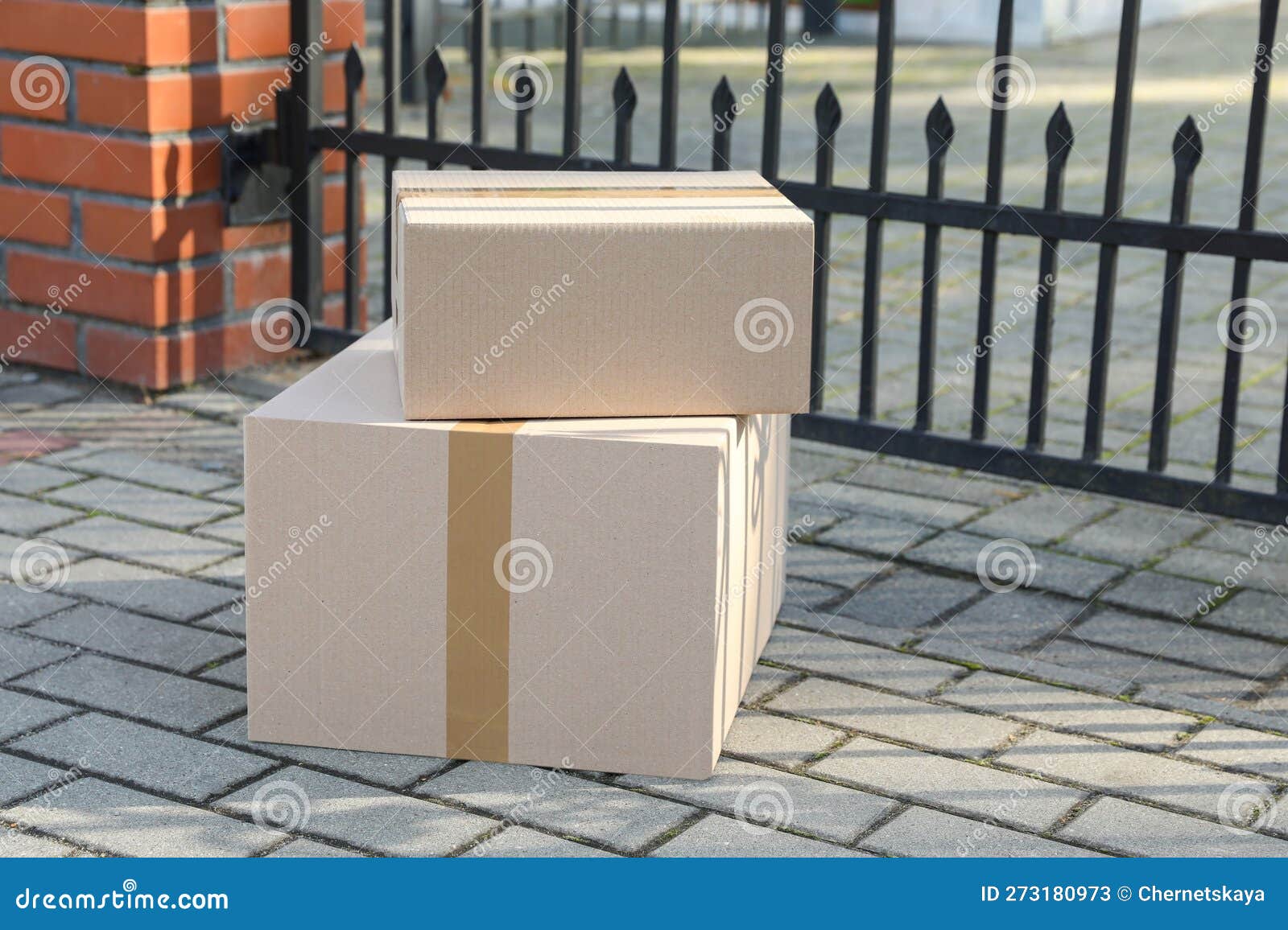 Stack of Parcels Delivered Near Front Gates Stock Image - Image of ...