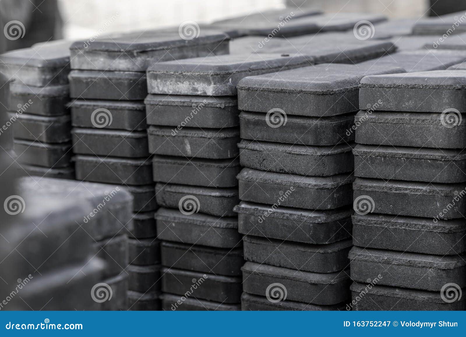 Stack of Paving Stone on Construction Site. Bricks for Paving Stones ...