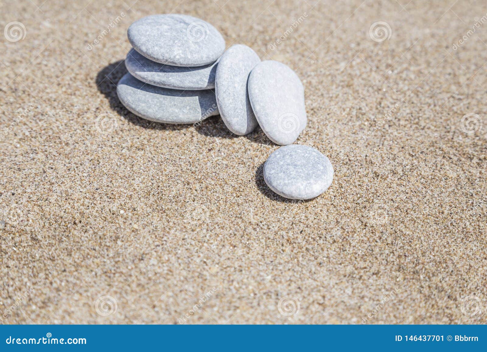 Stack of Pebble Stones Unbalanced on a Sandy Beach Stock Image - Image ...