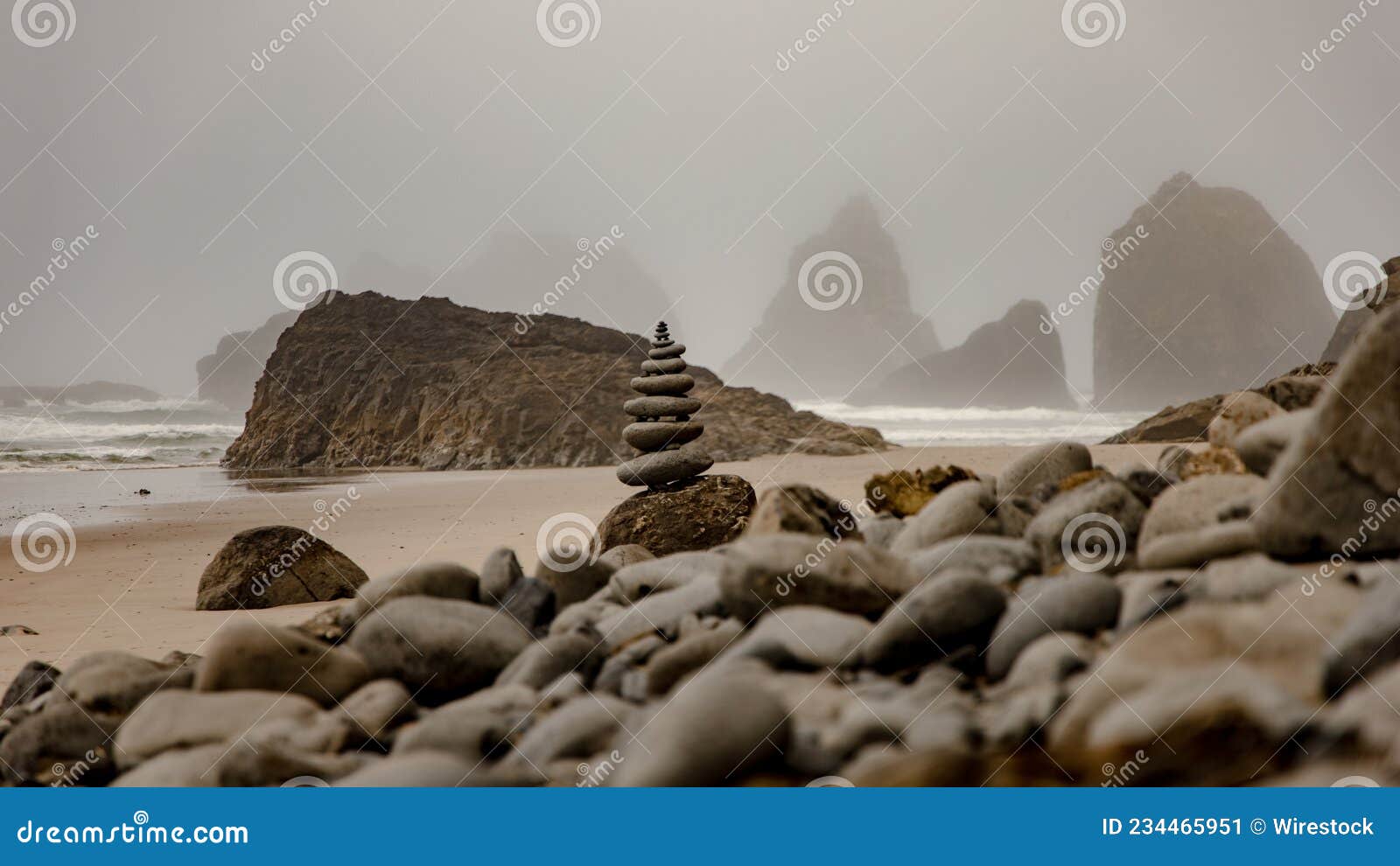Stack of Pebbles on Sand in a Foggy Ocean Side, Horizontal Background ...