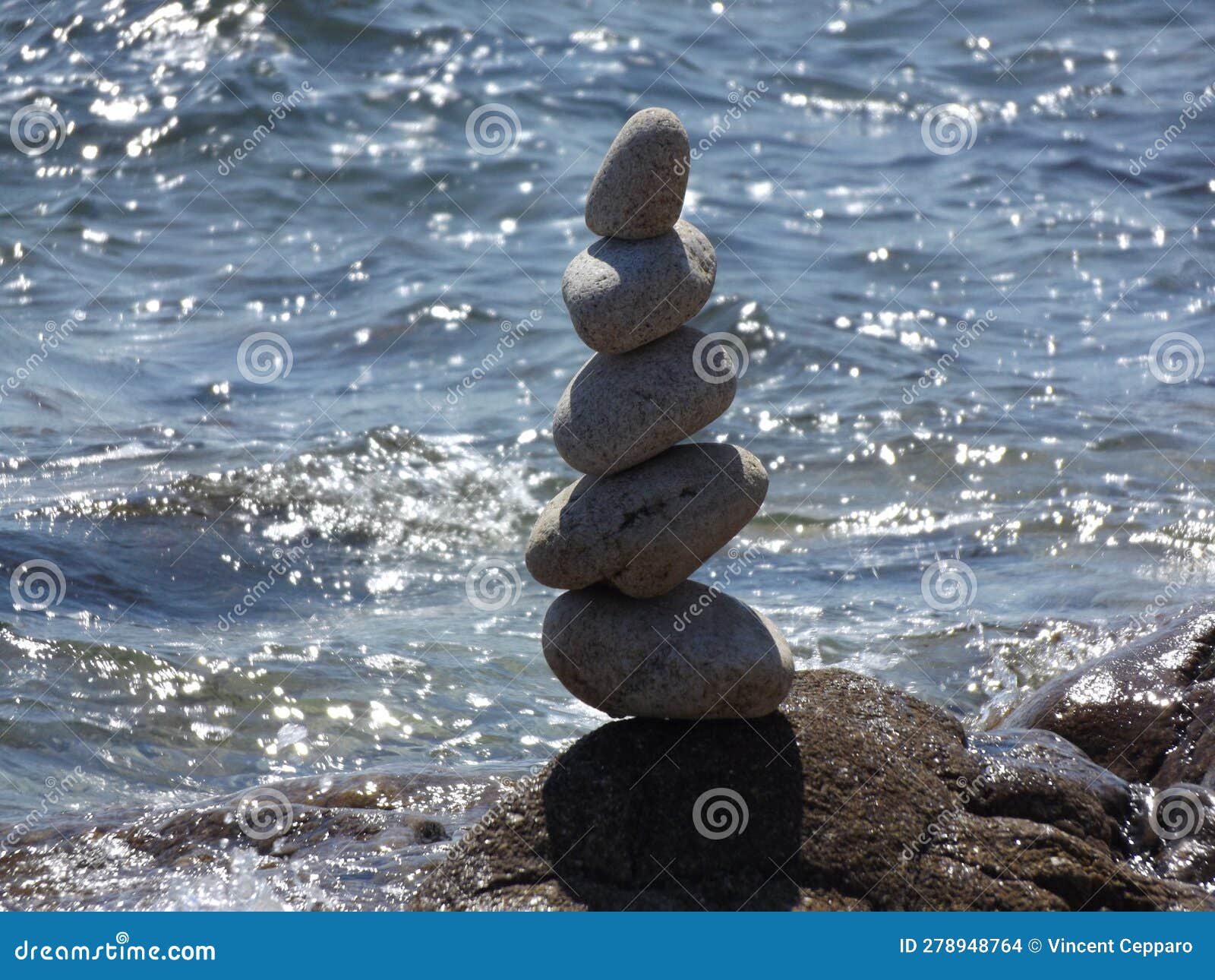 A Stack of Pebbles by the Sea Stock Photo - Image of pebbles, stones ...