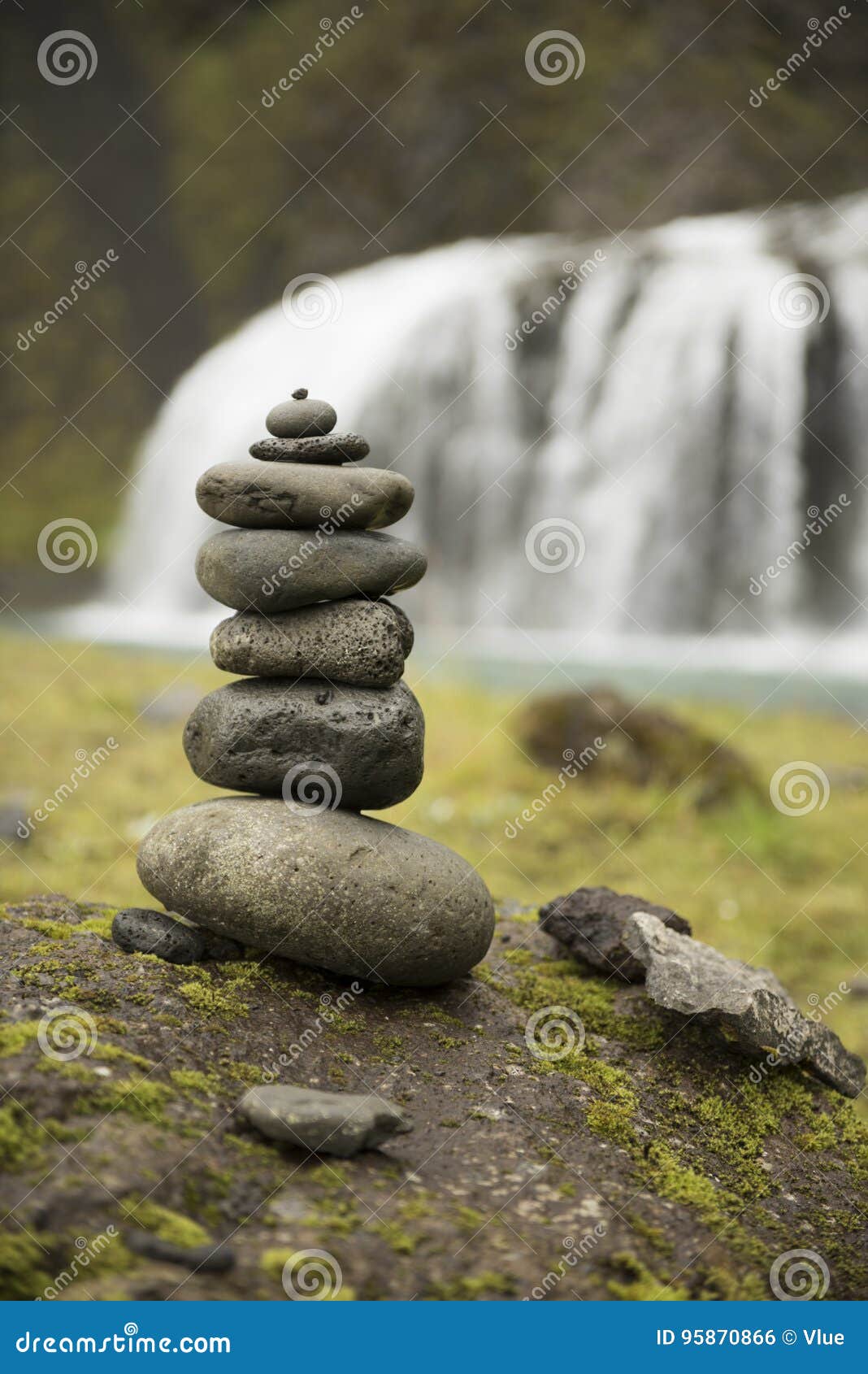 Stack of Pebbles and Waterfall Stock Photo - Image of green, outdoor ...