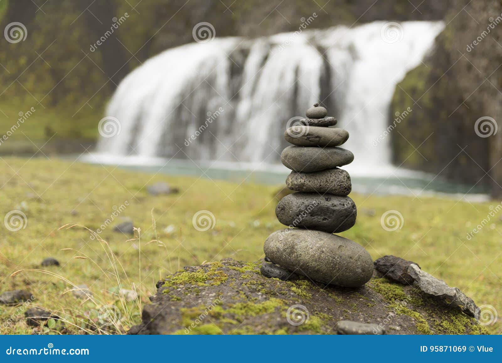 Stack of Pebbles and Waterfall Stock Image - Image of heap, nature ...