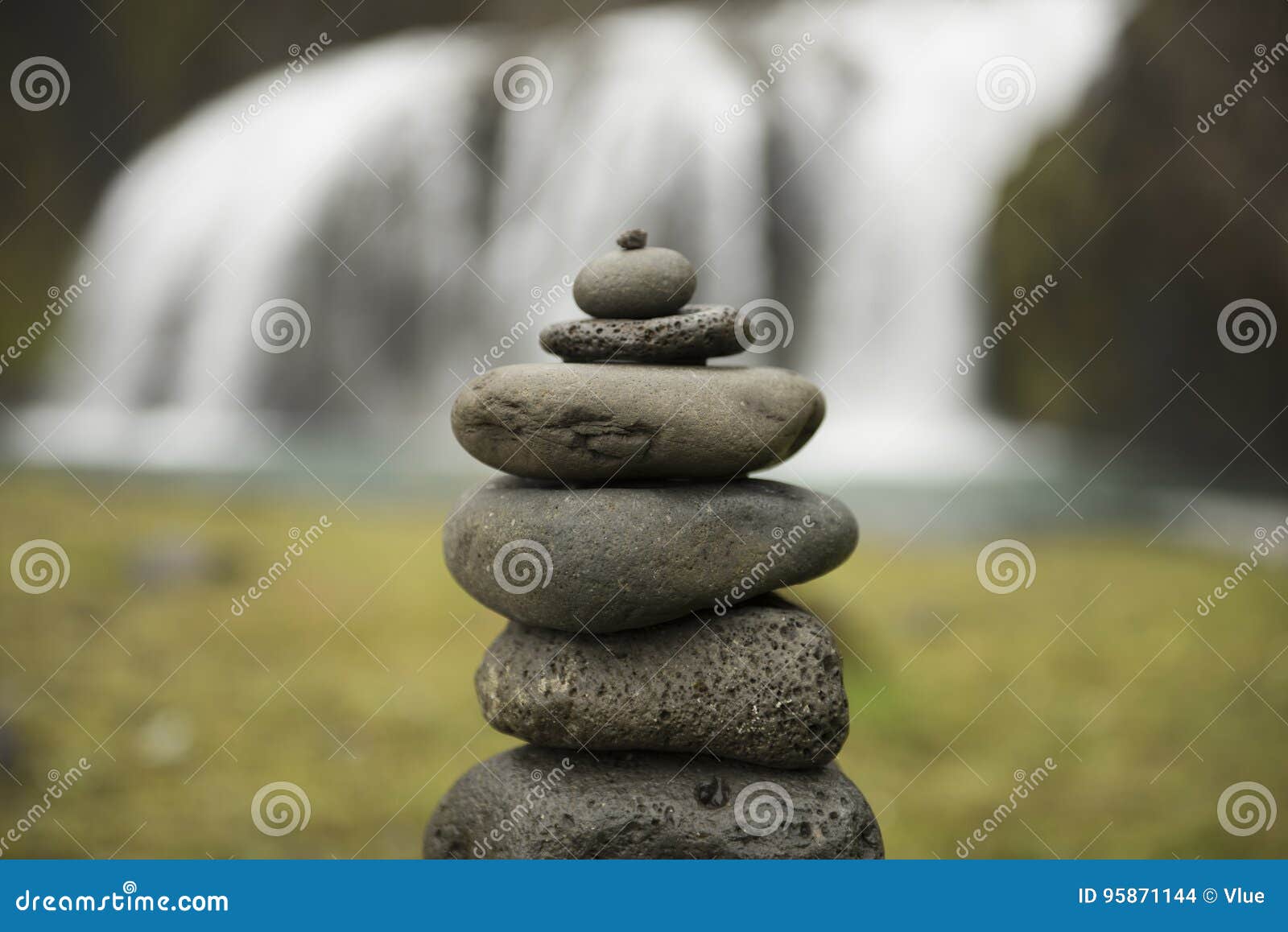Stack of Pebbles and Waterfall Stock Photo - Image of group, nature ...