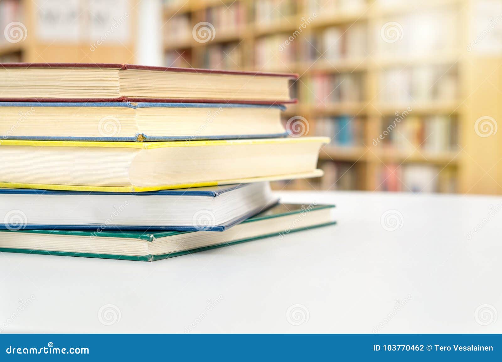 Stack and Pile of Books on Table in Public or School Library. Stock ...