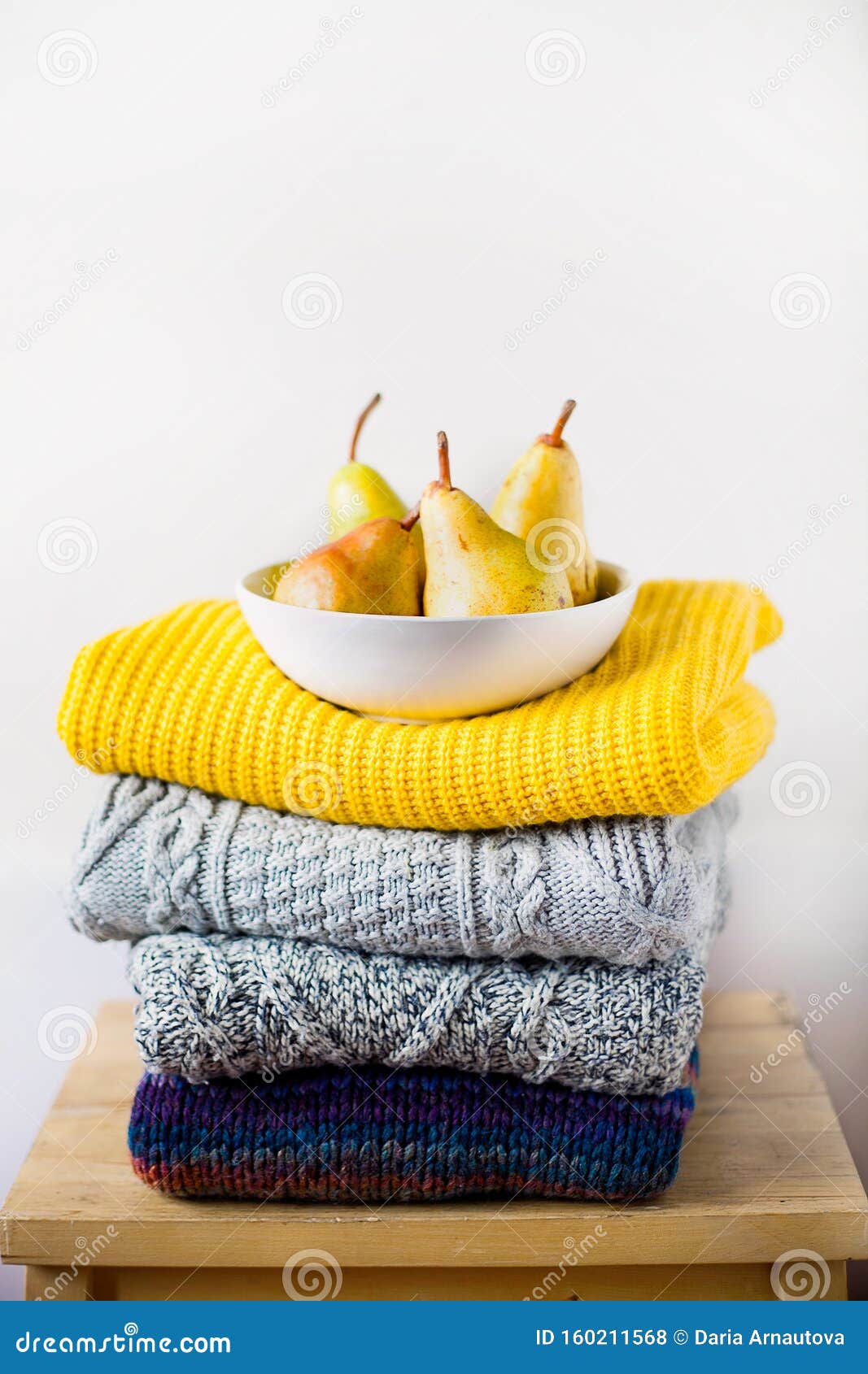 Stack or Pile of Fashionable Knitted Colors Wool Clothes or Sweaters ...