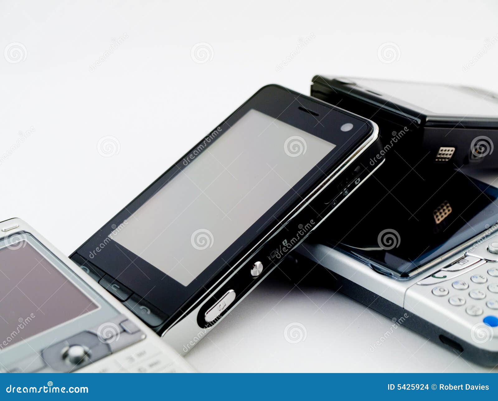 Stack Pile of Several Modern Mobile Phones PDA Stock Photo - Image of ...